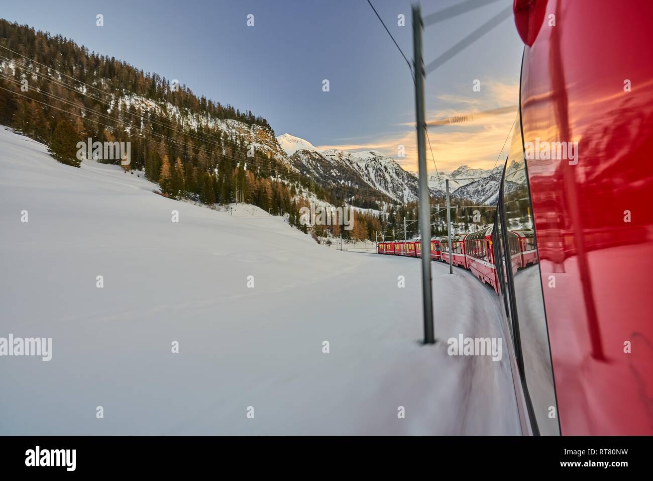 The Bernina Express Red Train through the Alps Stock Photo - Alamy