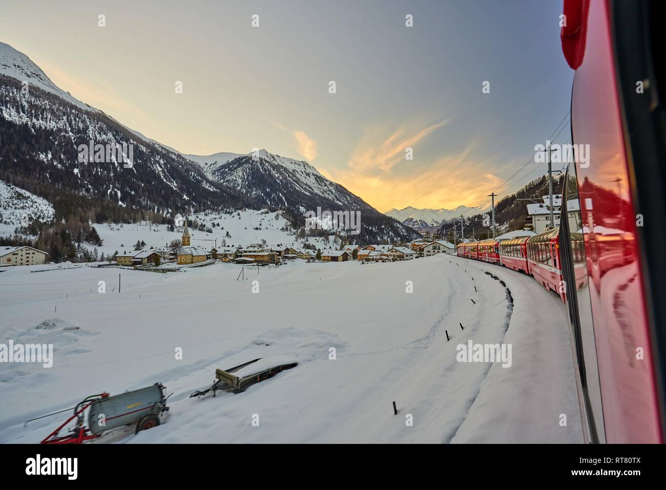 The Bernina Express Red Train through the Alps Stock Photo - Alamy
