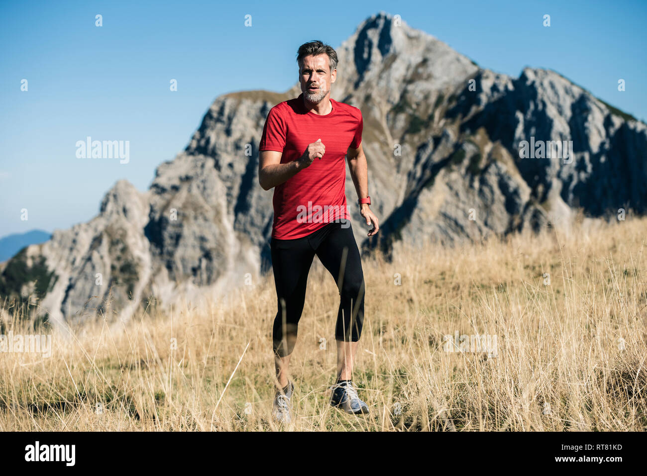 Adult running on rocks hi-res stock photography and images - Alamy