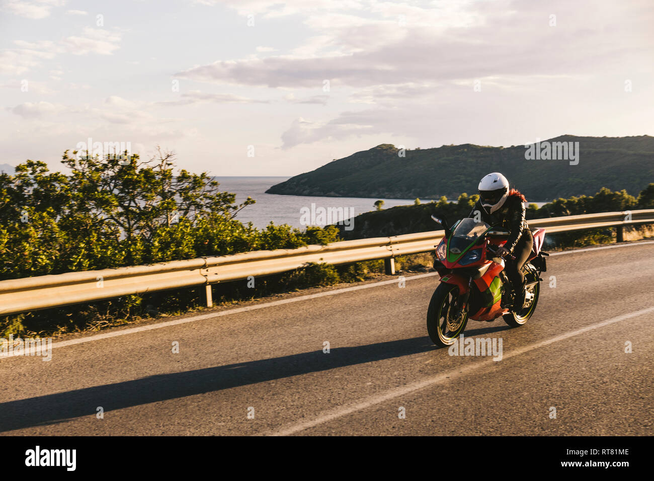 Moving motorcyclist hi-res stock photography and images - Alamy