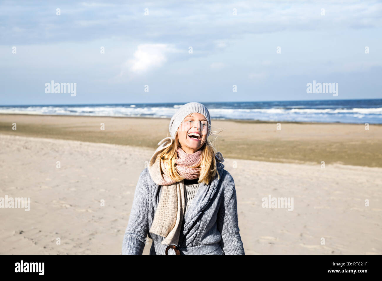 Happy woman on the beach Stock Photo - Alamy