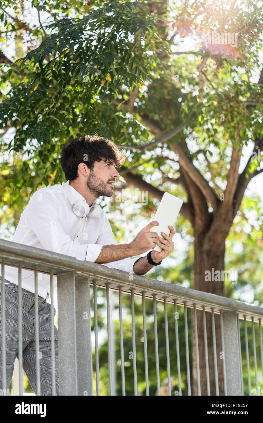 Man leaning railing hi-res stock photography and images - Alamy