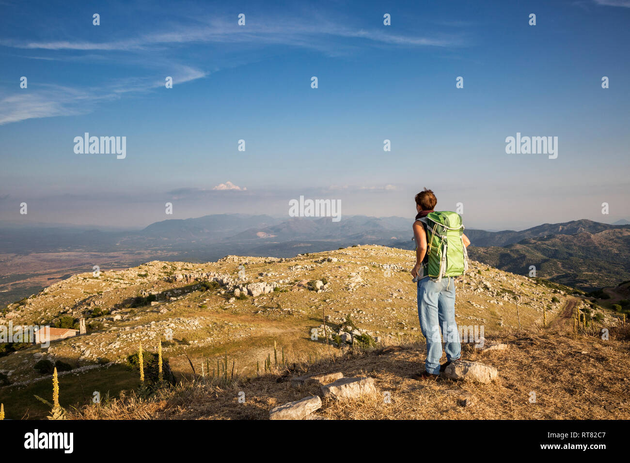 Greece, Peloponnese, Arcadia, Lykaion, woman enjoying the view from ...