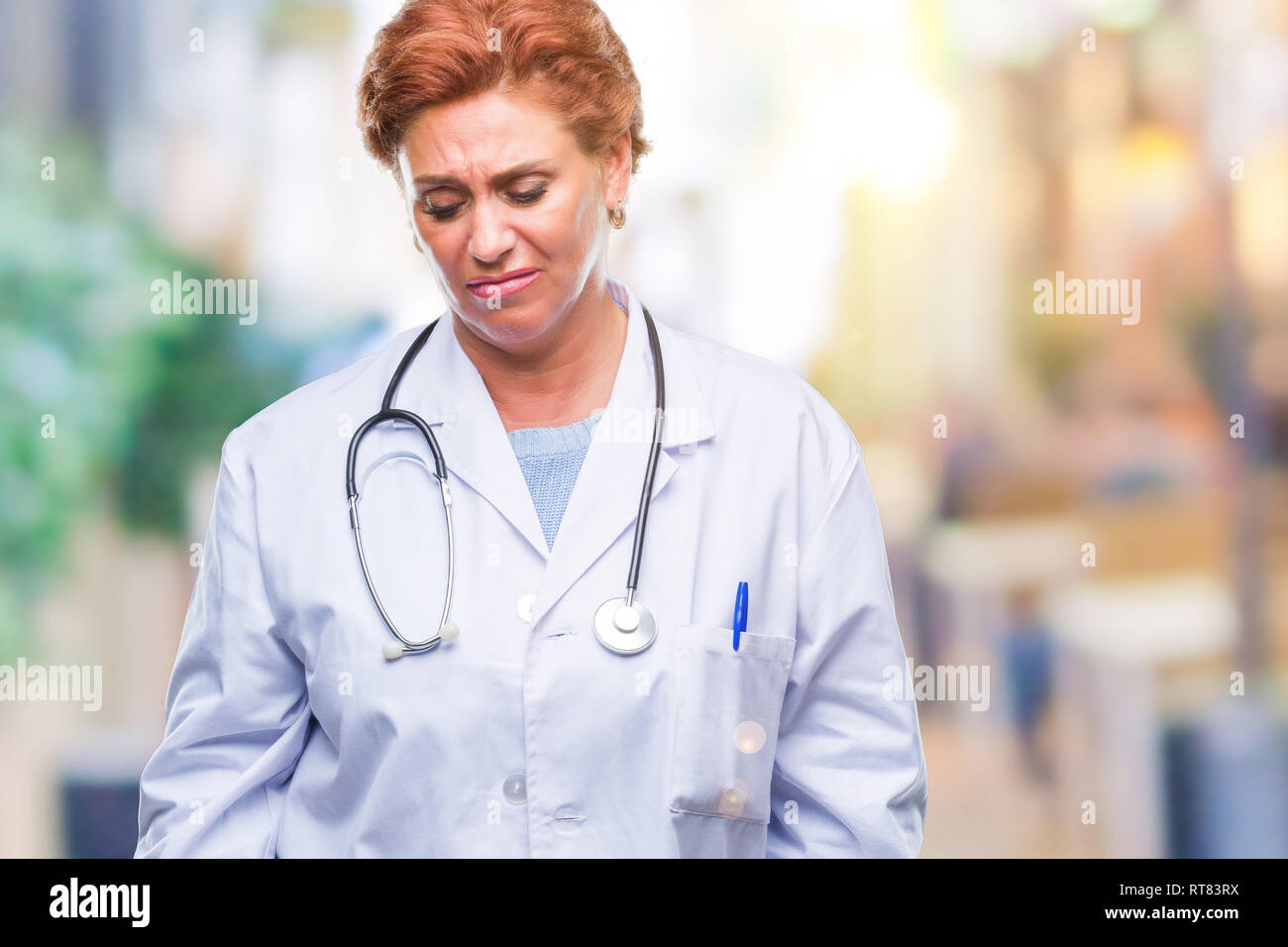 Senior caucasian doctor woman wearing medical uniform over isolated ...