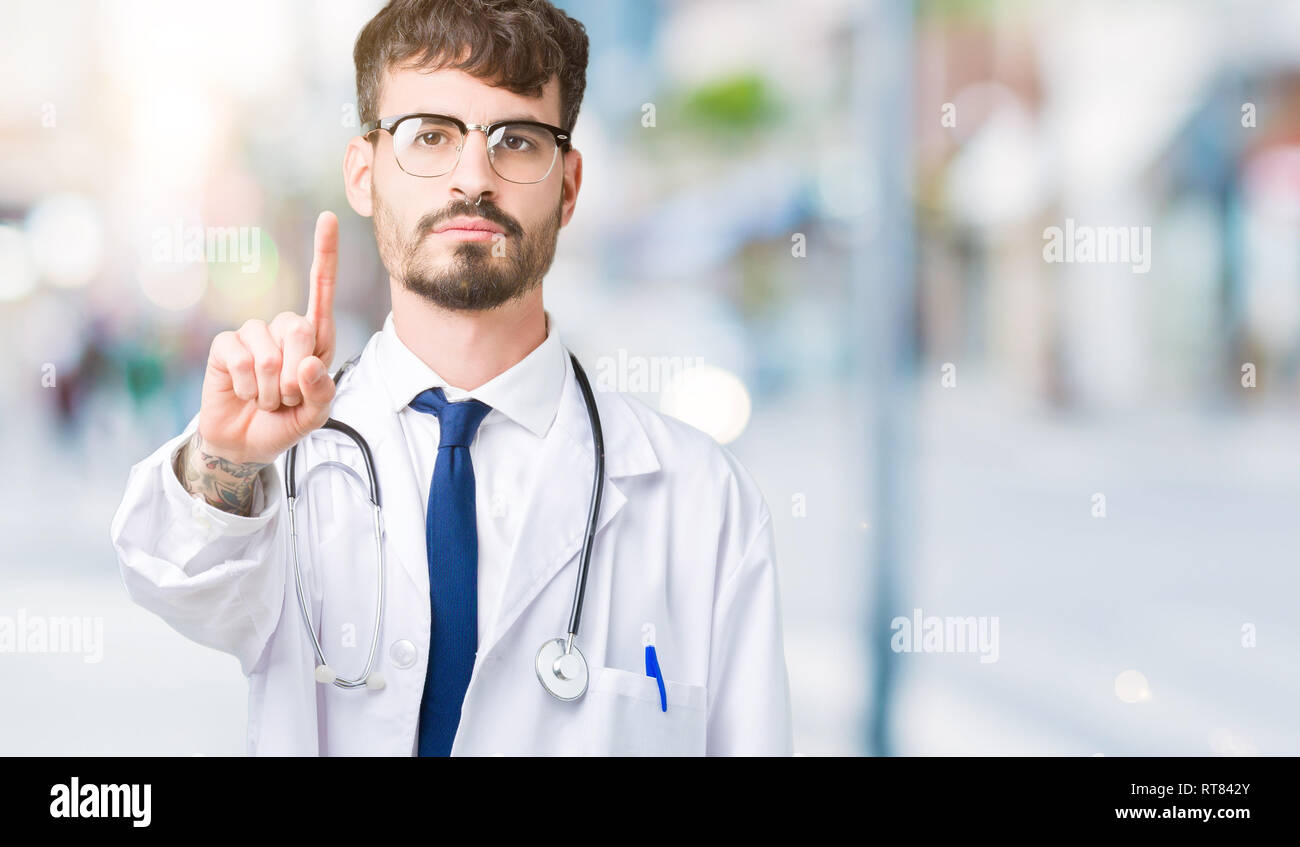 Angry pointing doctor young man hi-res stock photography and images - Alamy