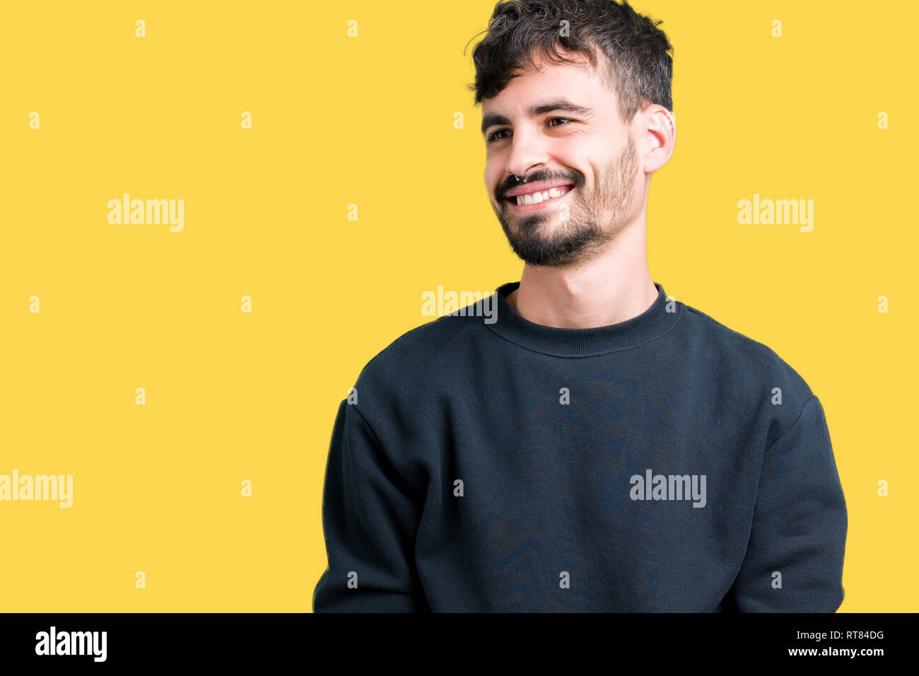 Young handsome man over isolated background looking away to side with ...