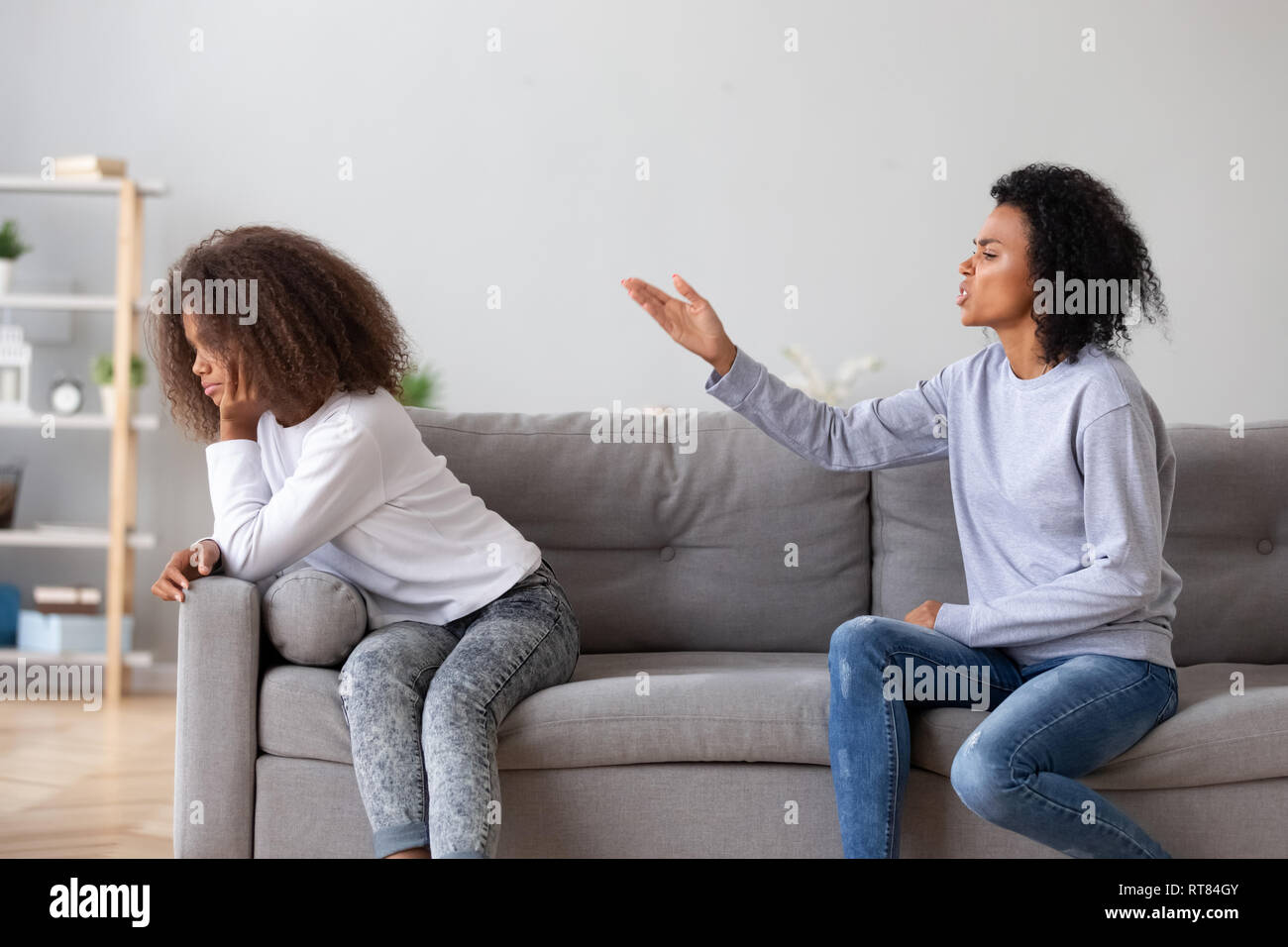 Angry aggressive mother scolding teen daughter at home Stock Photo - Alamy