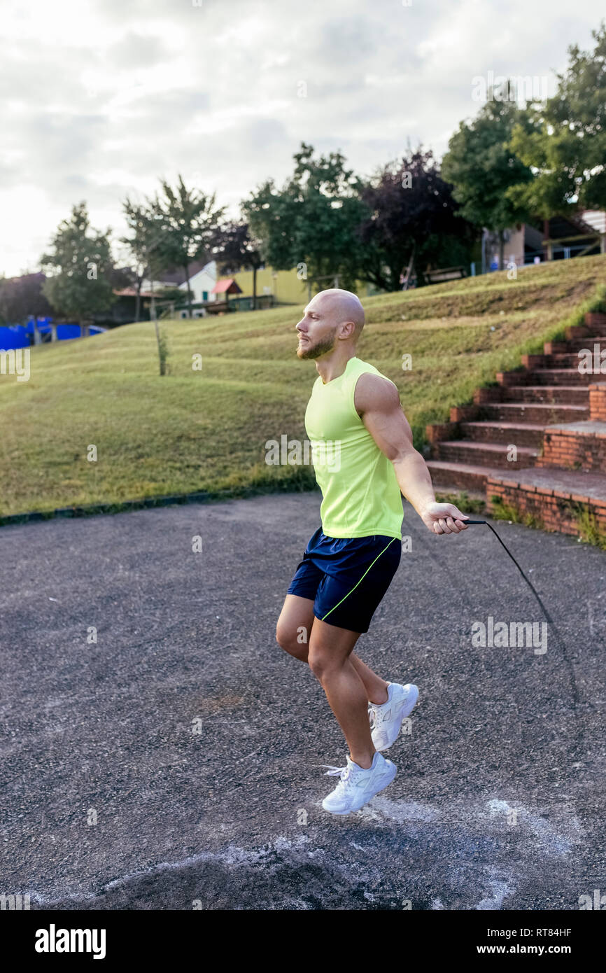 Muscular man skipping rope hi-res stock photography and images - Alamy