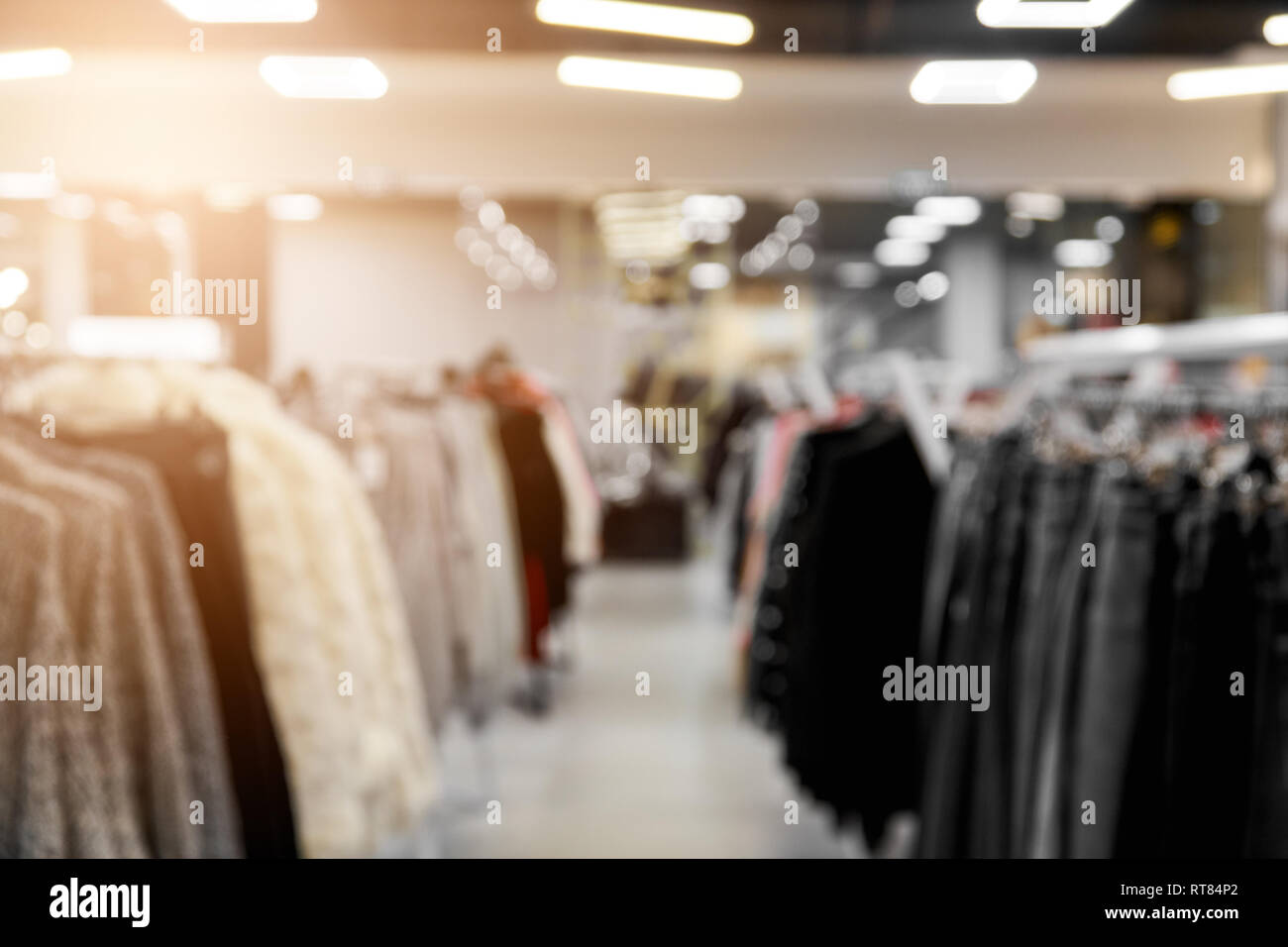 blurred image background with clothing store Stock Photo - Alamy