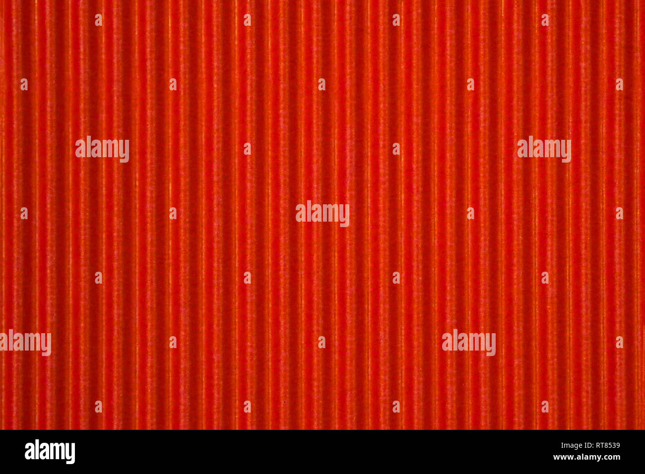 Red corrugated paper texture, use for background. vivid colour with ...
