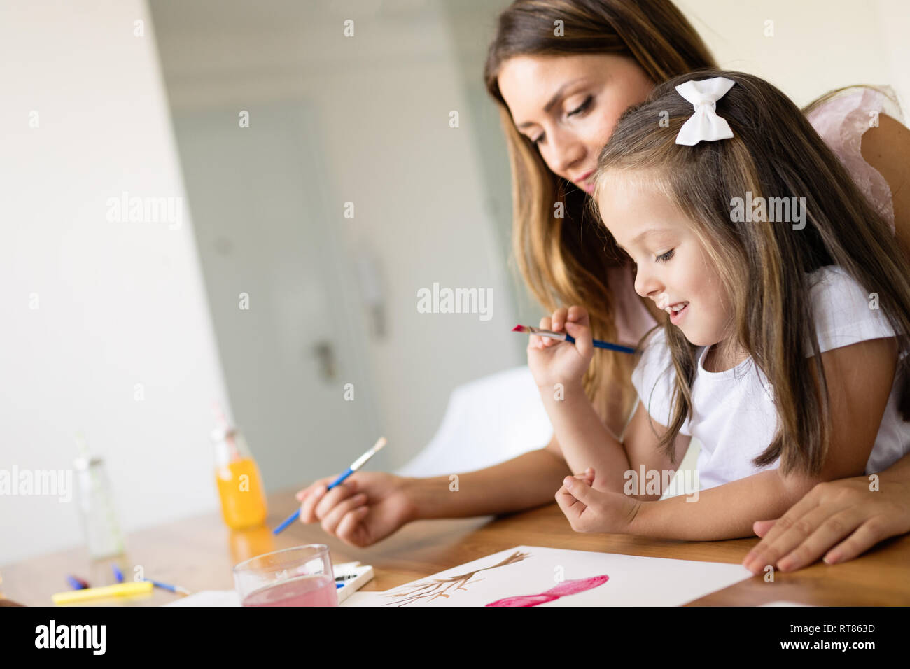 Happy family having fun time at home Stock Photo - Alamy
