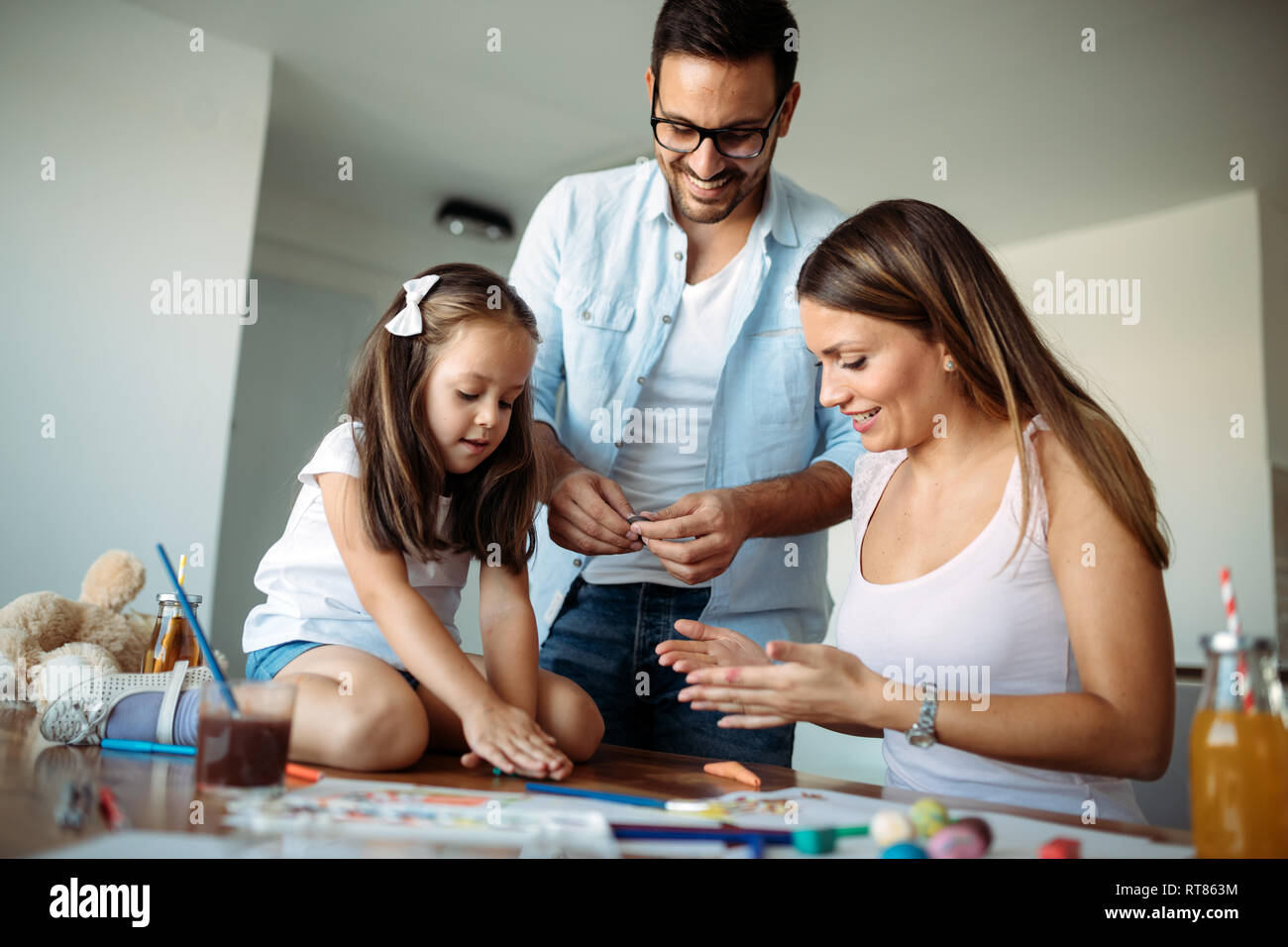 Happy family having fun time at home Stock Photo - Alamy
