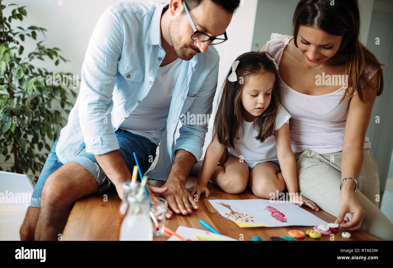 Happy family having fun time at home Stock Photo - Alamy