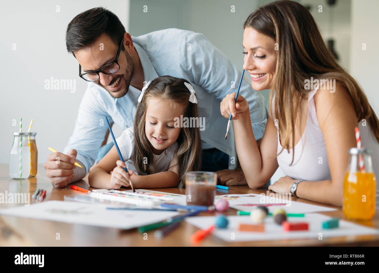 Happy family having fun time at home Stock Photo - Alamy