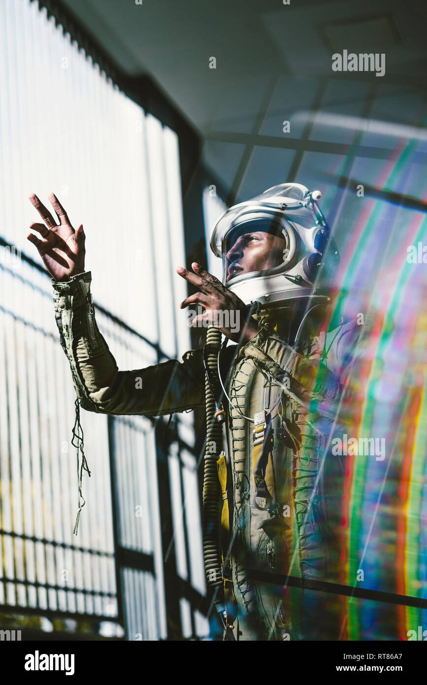 Lost astronaut in spacesuit Stock Photo - Alamy