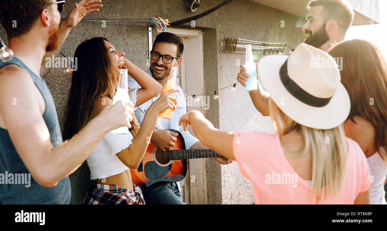 Friends having fun outdoors and are happy Stock Photo - Alamy