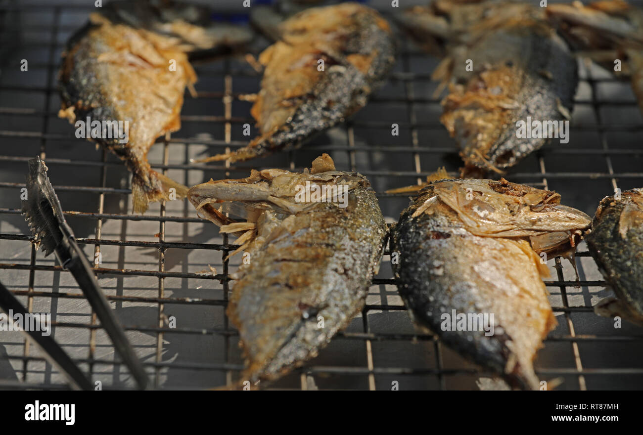 Grilled fried fish Stock Photo - Alamy