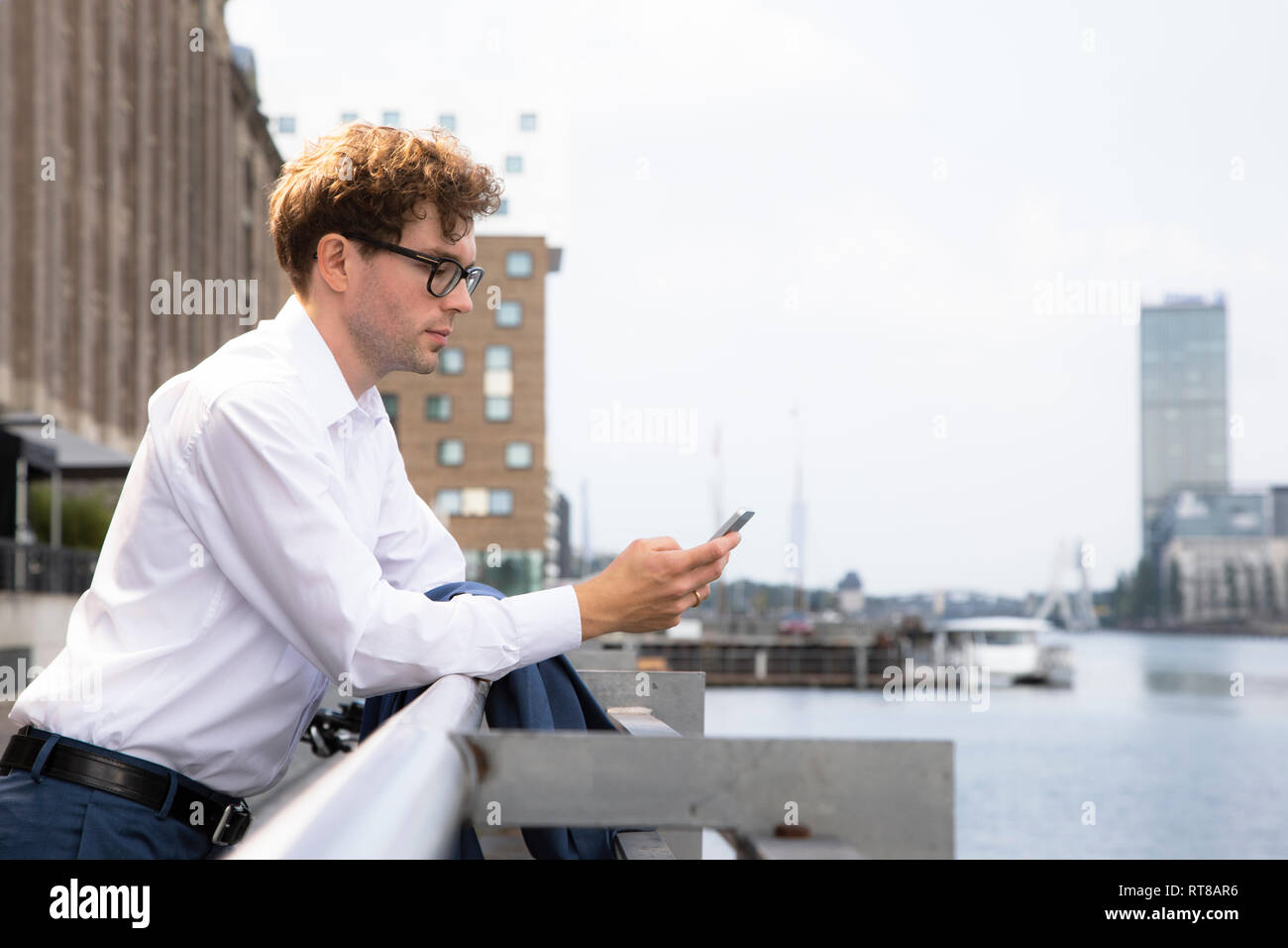 Man leaning railings hi-res stock photography and images - Alamy