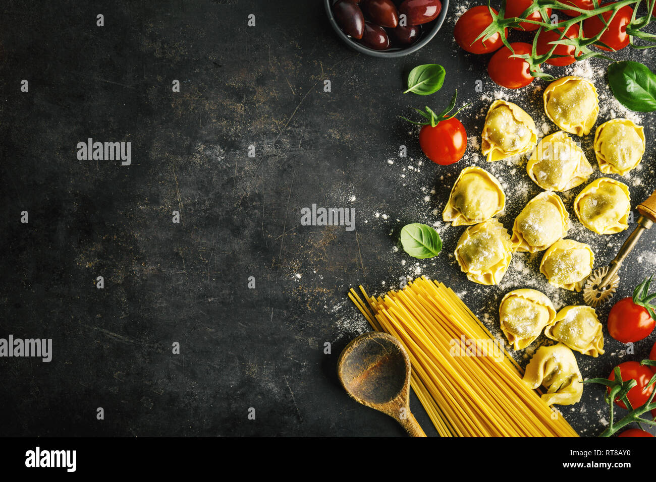 Food background. Italian food background with pasta, ravioli, tomatoes ...