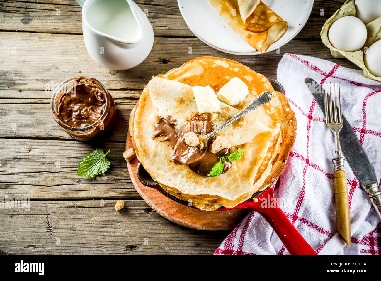 Homemade crepes with chocolate sauce, russian and ukrainian thin ...
