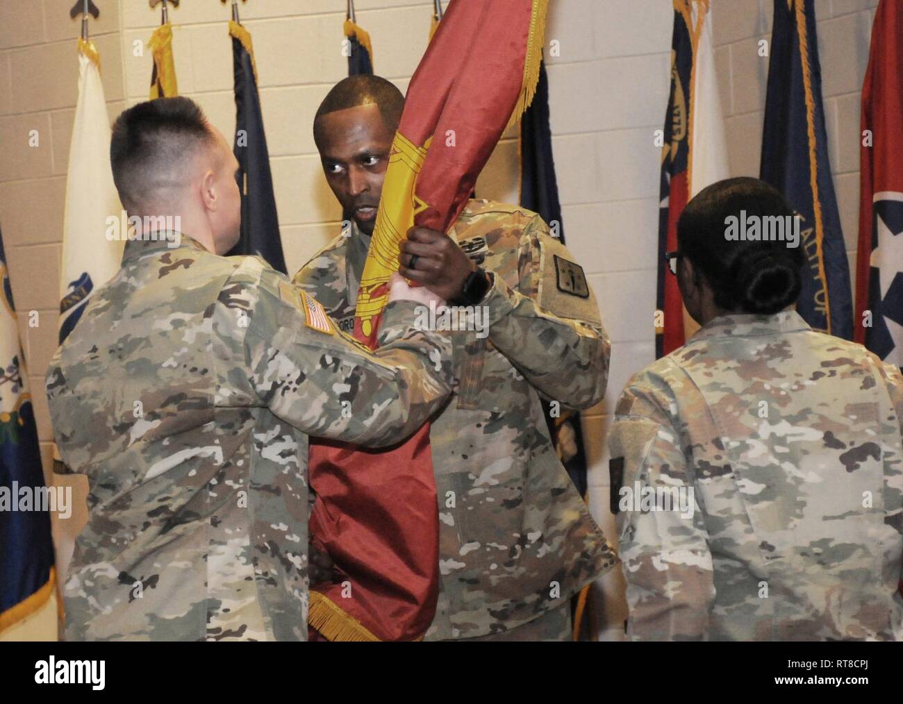 Command Sgt. Maj. Terrence T. Scarborough accepts the Transportation ...