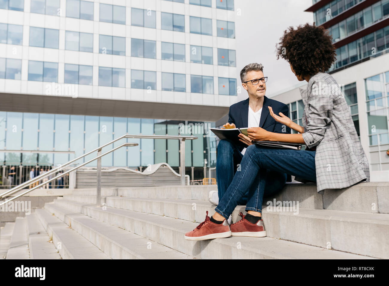 Working together building hi-res stock photography and images - Alamy