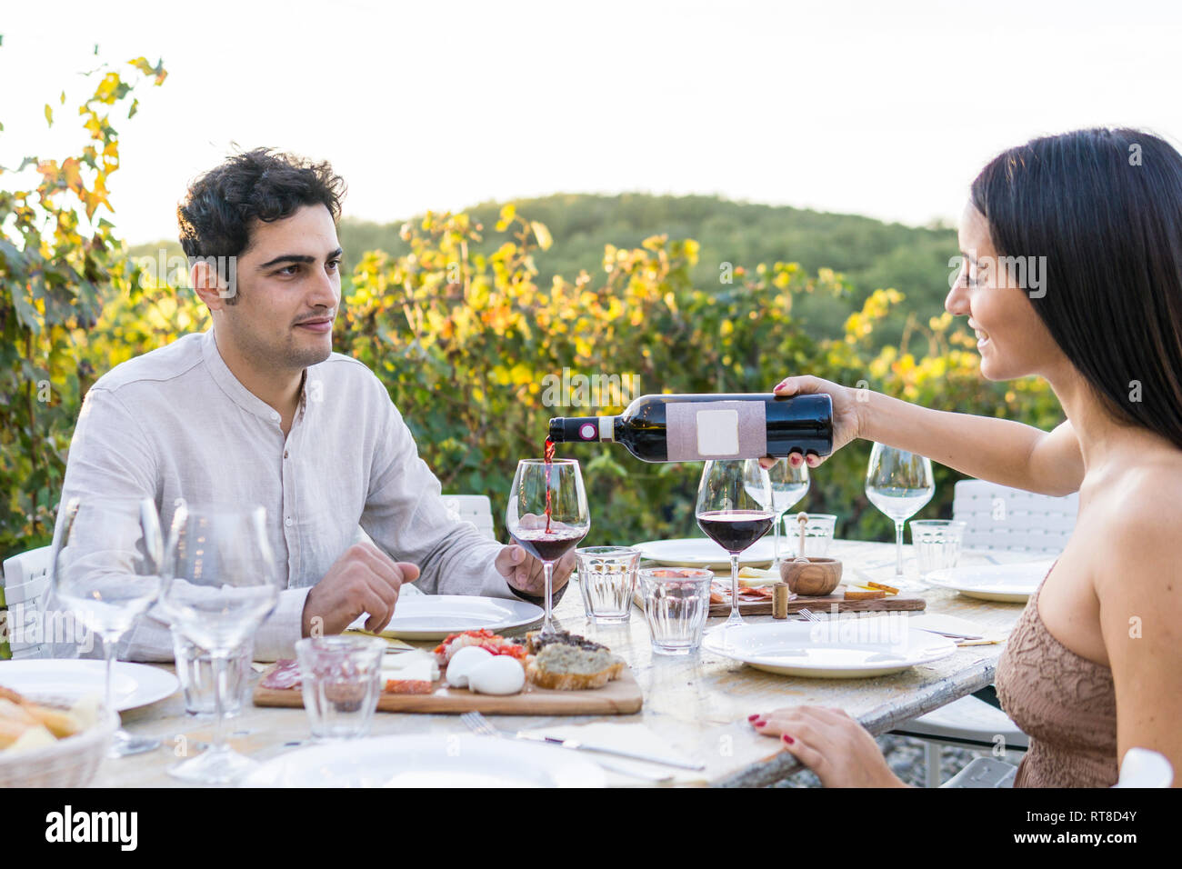 Two couples dinner table hi-res stock photography and images - Alamy