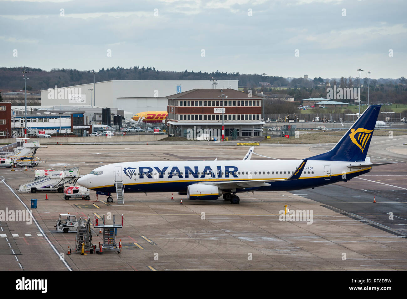 Ryanair aircraft waiting on the apron area of Luton airport, England ...