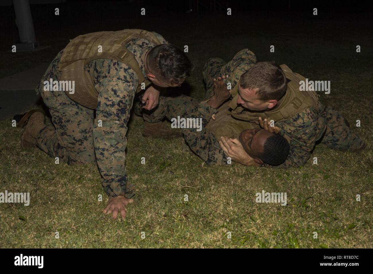 U.S. Marines with III Marine Expeditionary Force grapple during a ...