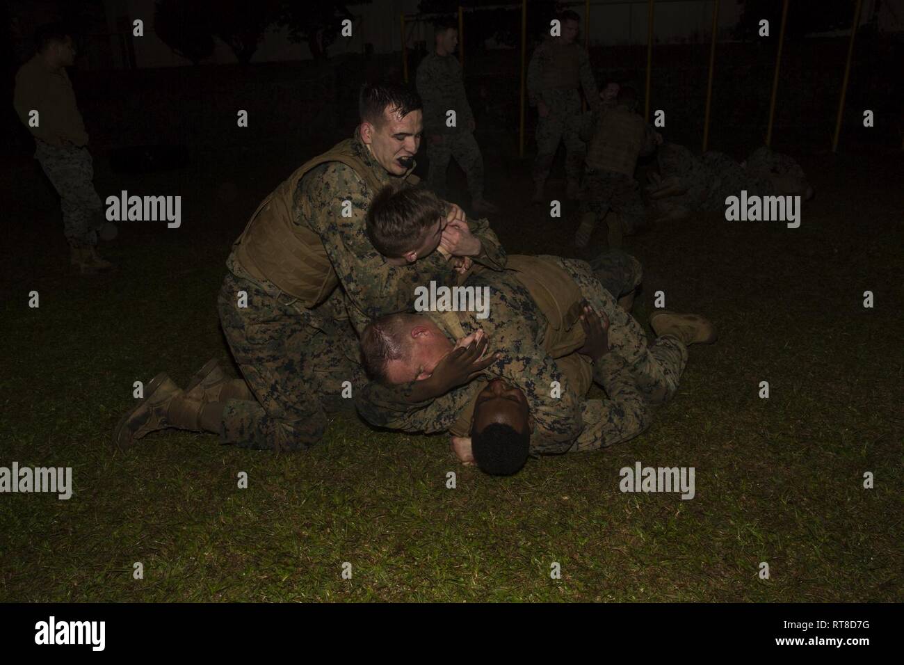 U.S. Marines with III Marine Expeditionary Force grapple during a ...