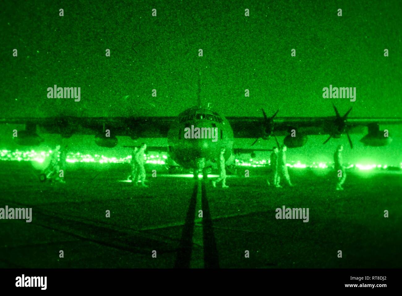 Airmen from the 9th Special Operations Squadron prepare an MC-130J ...