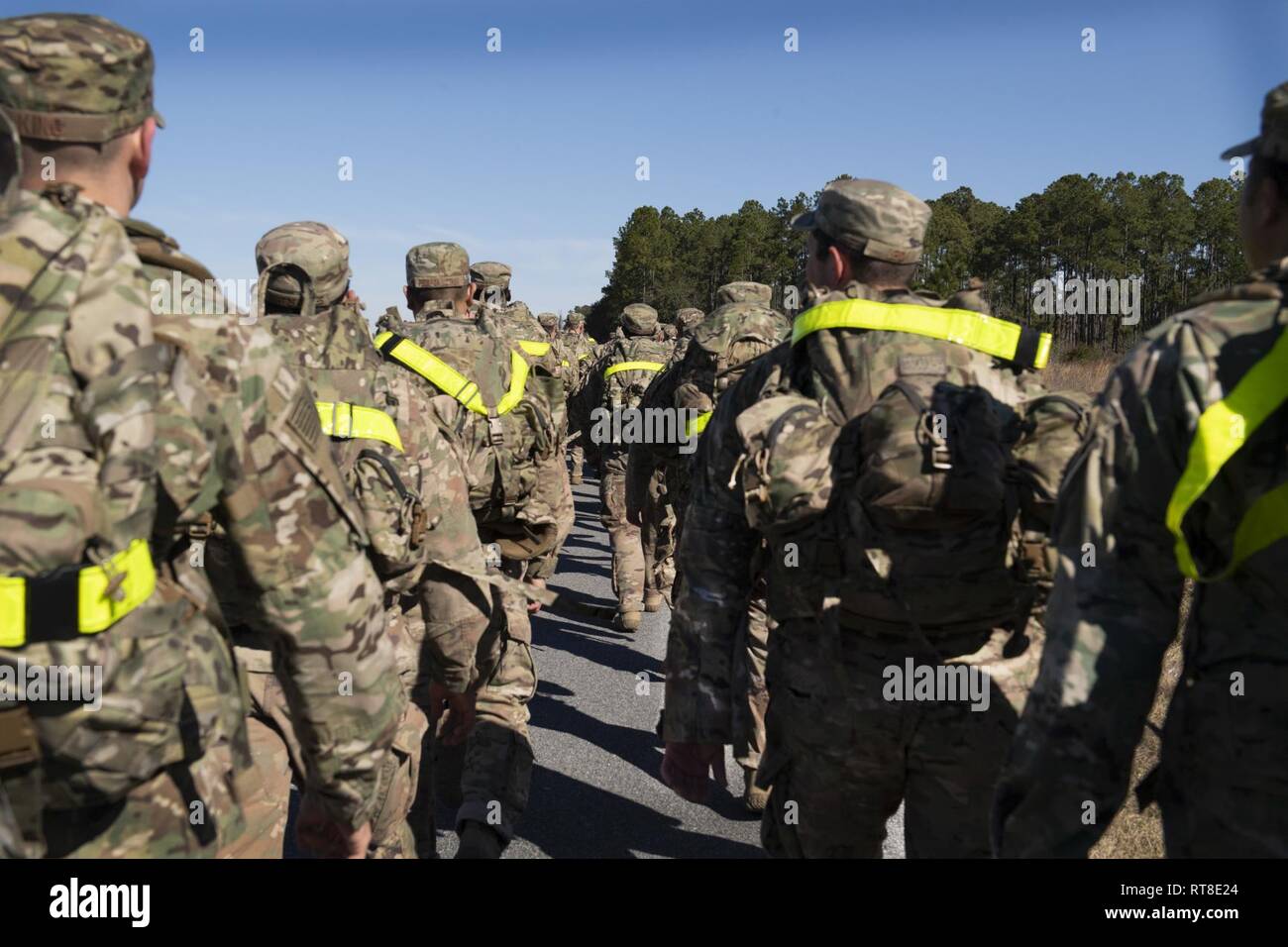 820th Base Defense Group Airmen move in a two-column formation during a ...