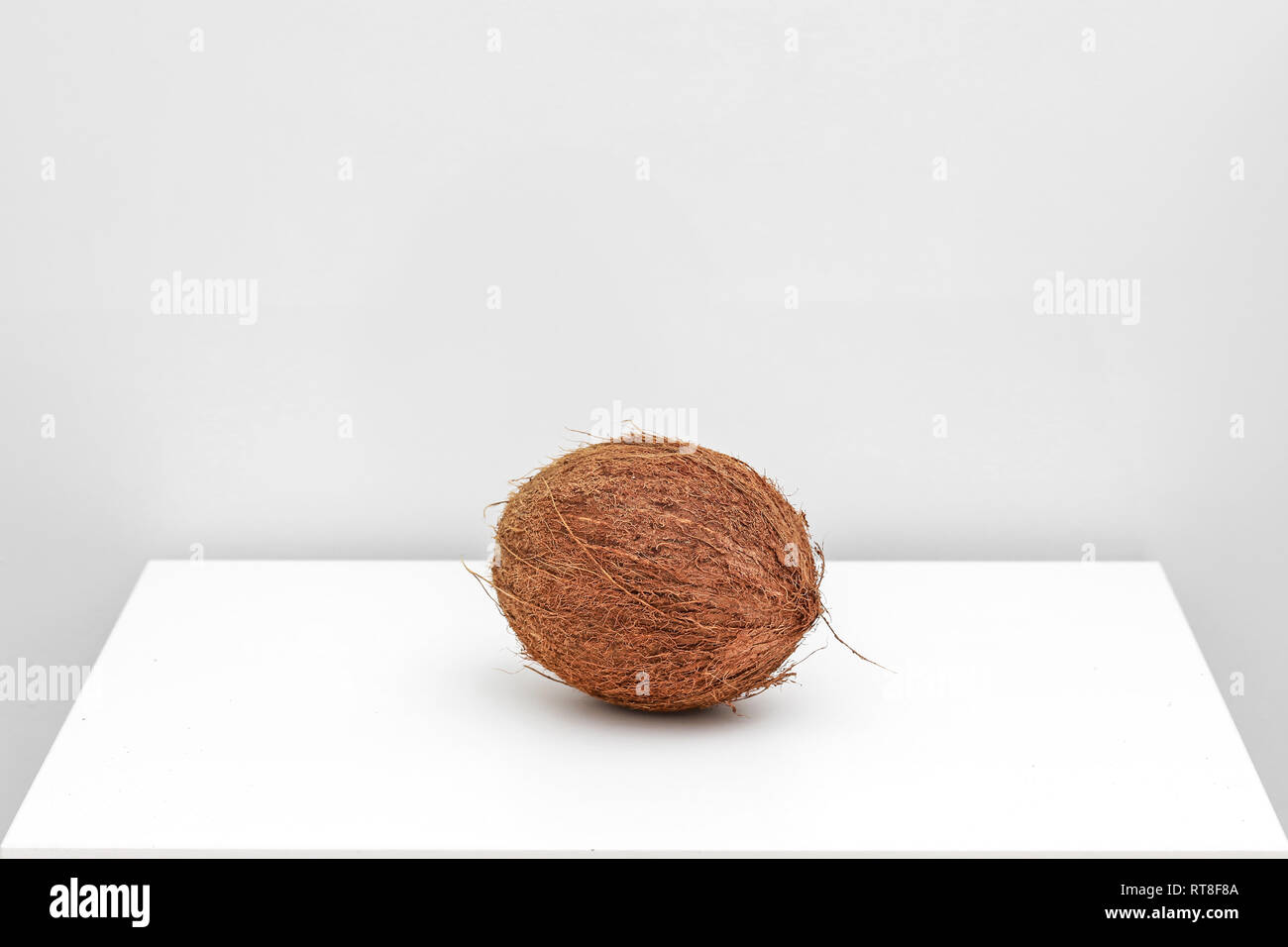 Homemade coconut products on white wooden table background Stock Photo ...