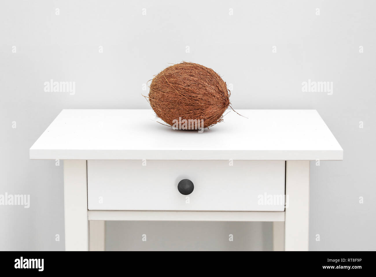 Homemade coconut products on white wooden table background Stock Photo ...