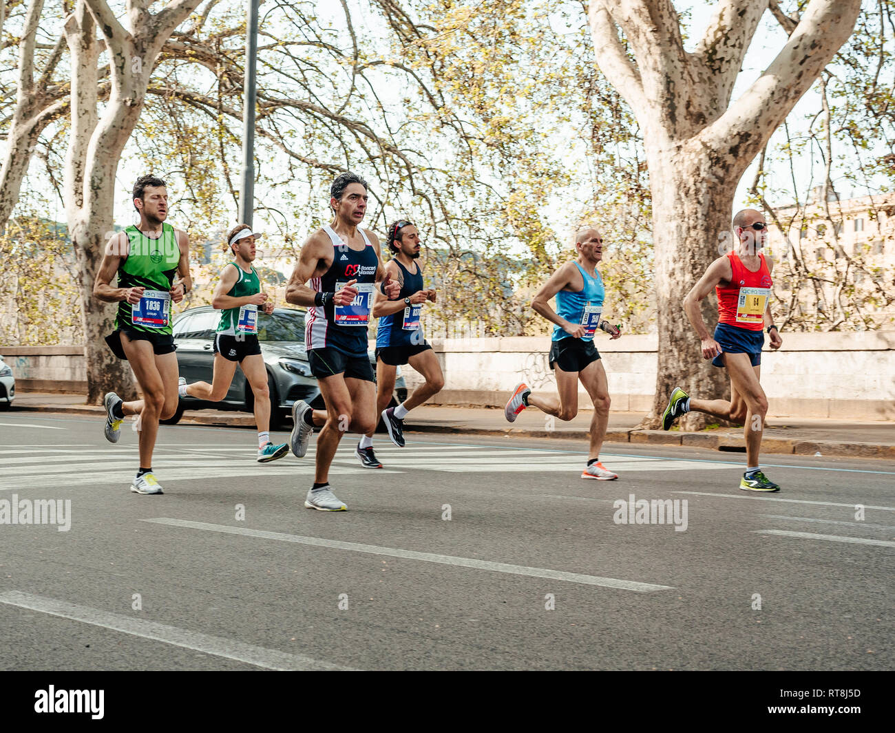 Rome, Italy - April 8, 2018: group of athletes runners running down ...
