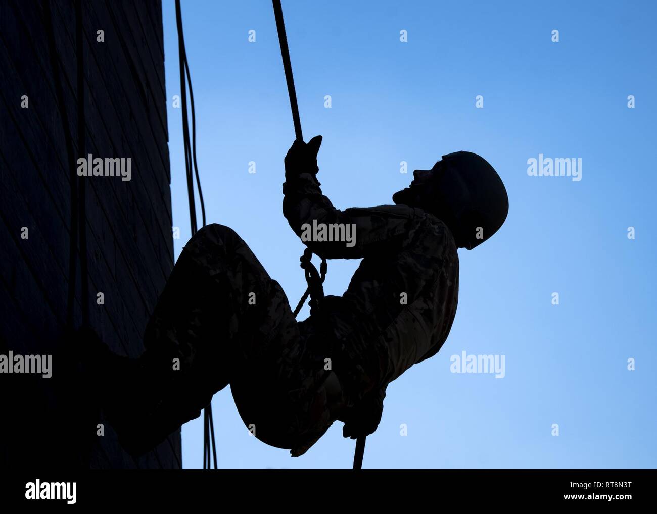 An Airman prepares to rappel down the Safeside Rappel Tower during an ...