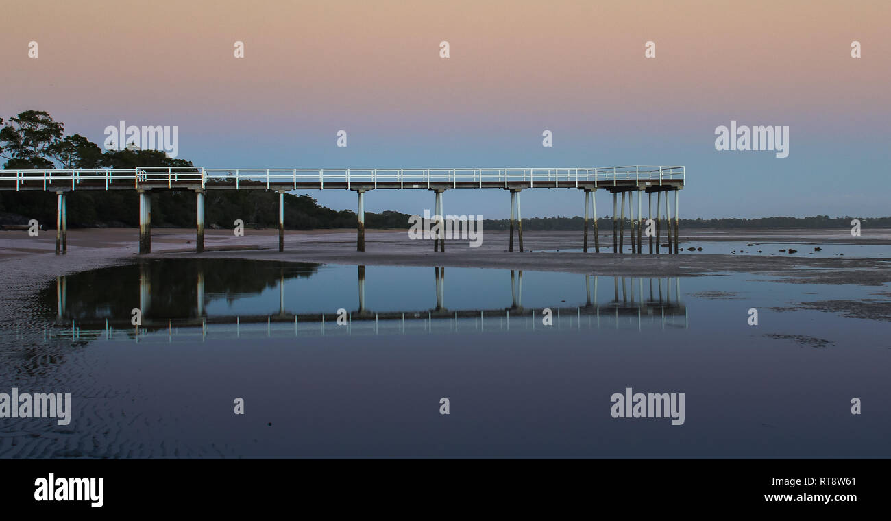 Calming beach sunset in australia hervey bay backpacker travel Stock ...