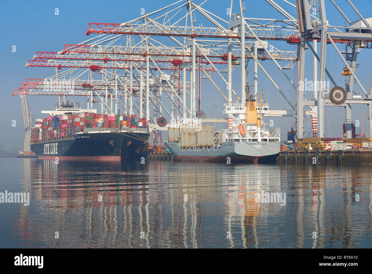 The Small Container Ship, MAIKE D, Front And The Larger Container Ship ...