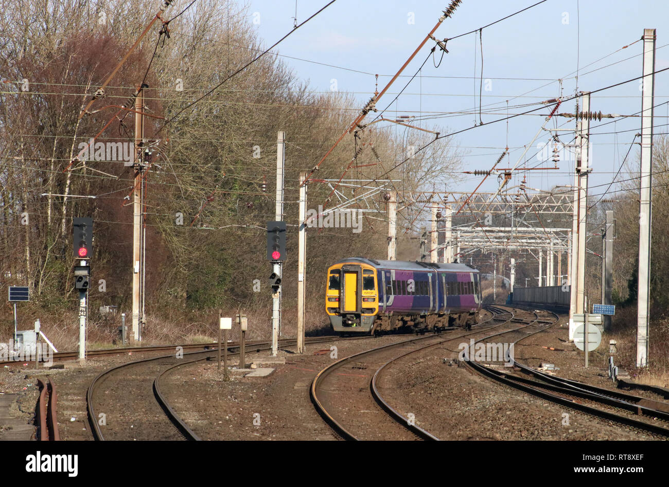 Class 158 express sprinter diesel multiple unit leaving Lancaster ...