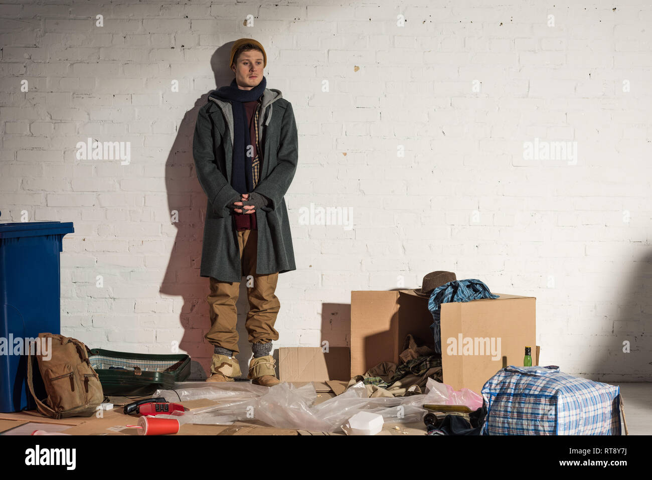 Homeless person standing hi-res stock photography and images - Alamy
