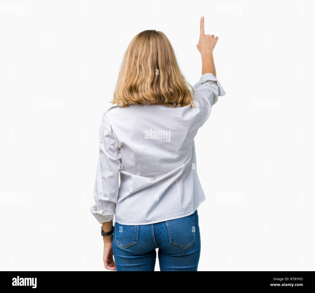 Beautiful young business woman over isolated background Posing ...