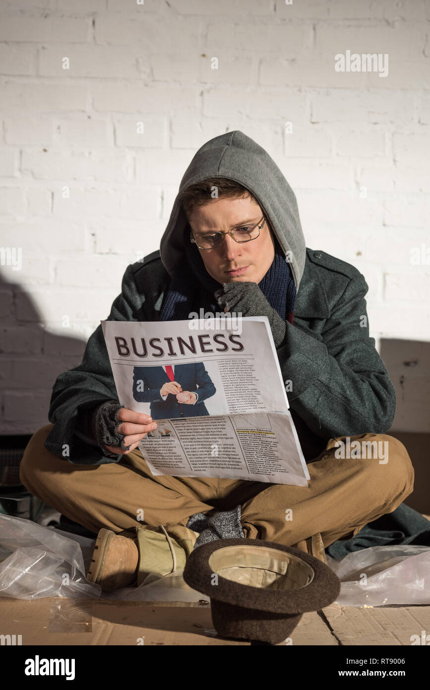 Lonely man reading newspaper hi-res stock photography and images - Alamy