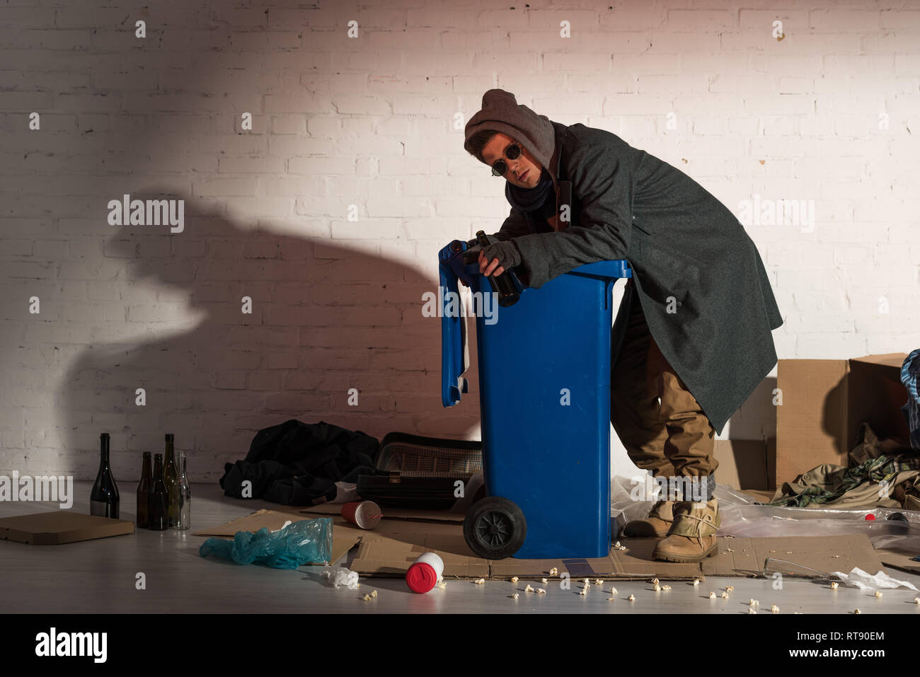 Rummaging hi-res stock photography and images - Alamy