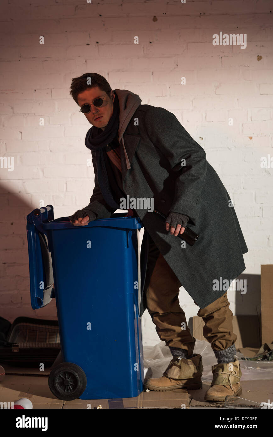 Poor Man Rummaging Garbage In High Resolution Stock Photography and ...