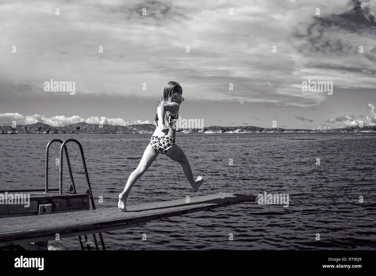 Girl diving board hi-res stock photography and images - Alamy