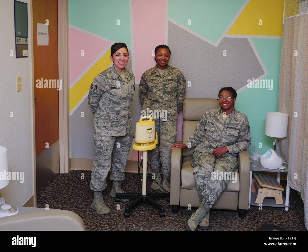 Airmen from the 90th Medical Group pose for a photo in the new clinic ...