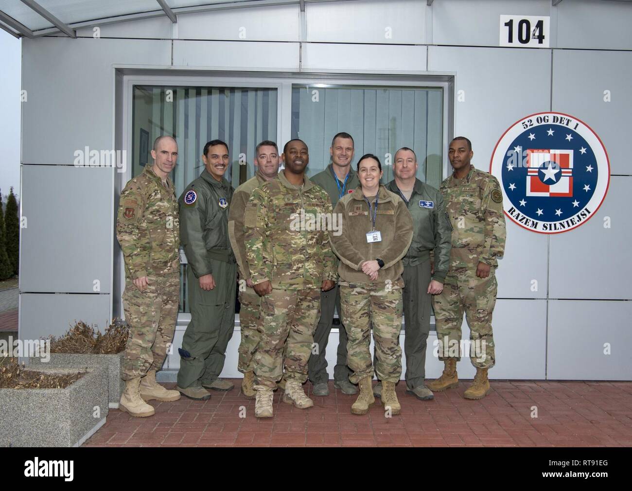 U.S. Air Force Col. Jason Bailey, 52nd Fighter Wing commander, far left ...