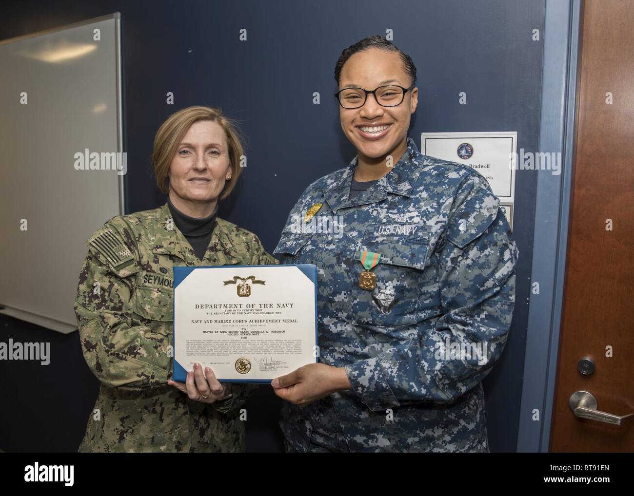 Master-at-Arms 2nd Class Veronica Robinson (right), poses for a photo ...