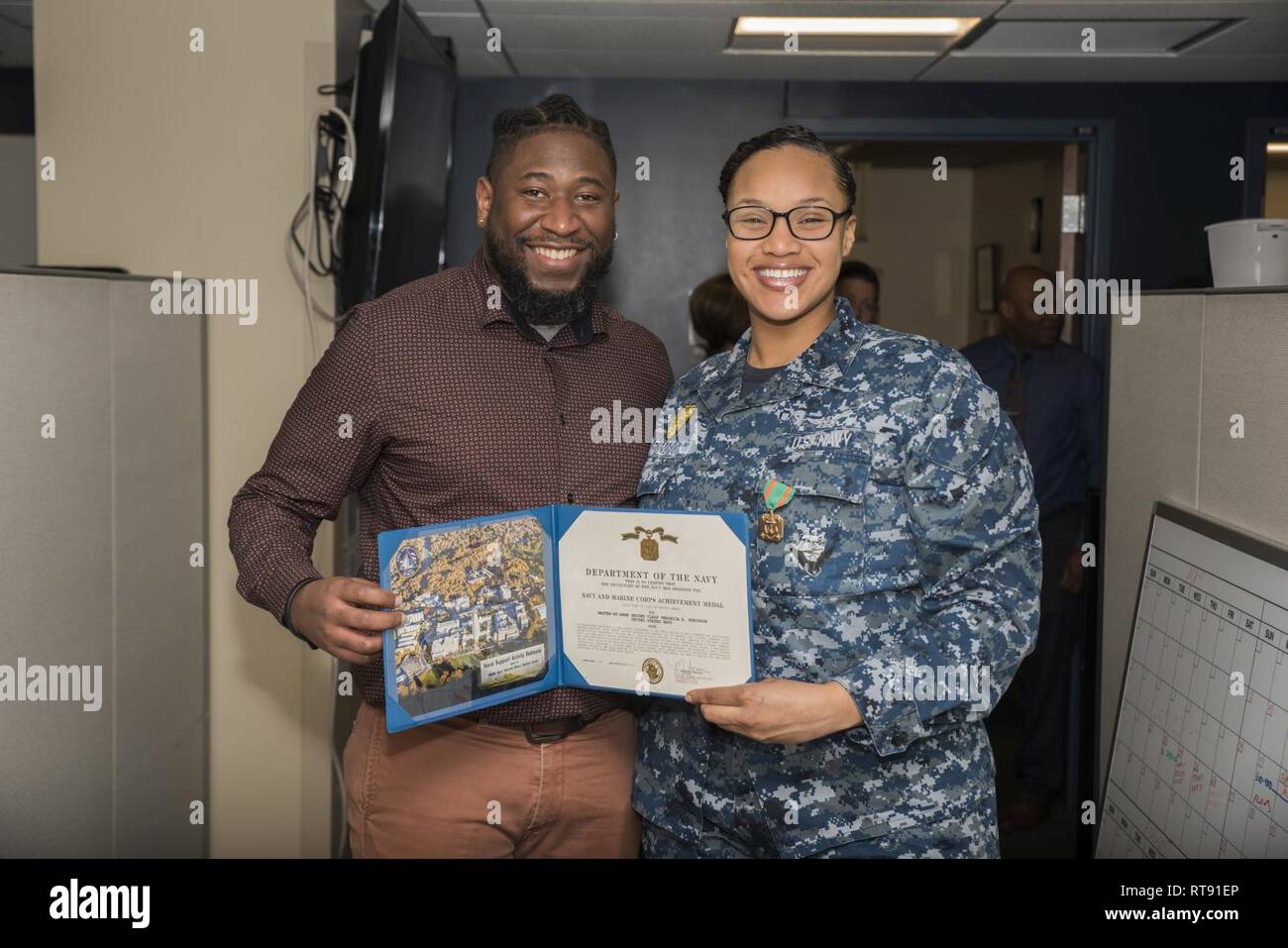 Master-at-Arms 2nd Class Veronica Robinson (right), poses for a photo ...