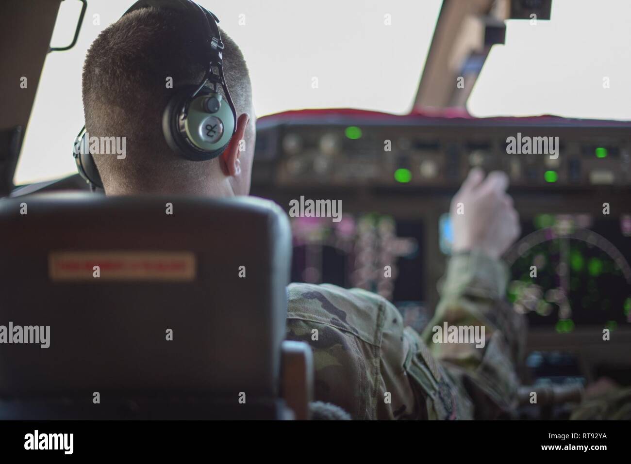 Lt. Col. Nicholas Laplant, 344th Air Refueling Squadron pilot, controls ...